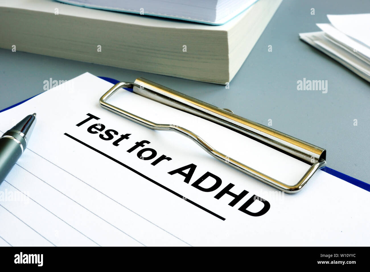 Test for ADHD form with pen and clipboard Stock Photo - Alamy