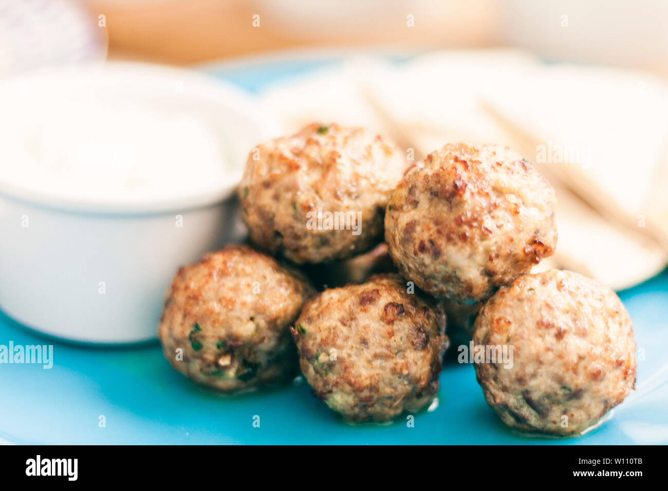 Fried minced meat with sauce and tortillas, traditional Greek lunch on ...
