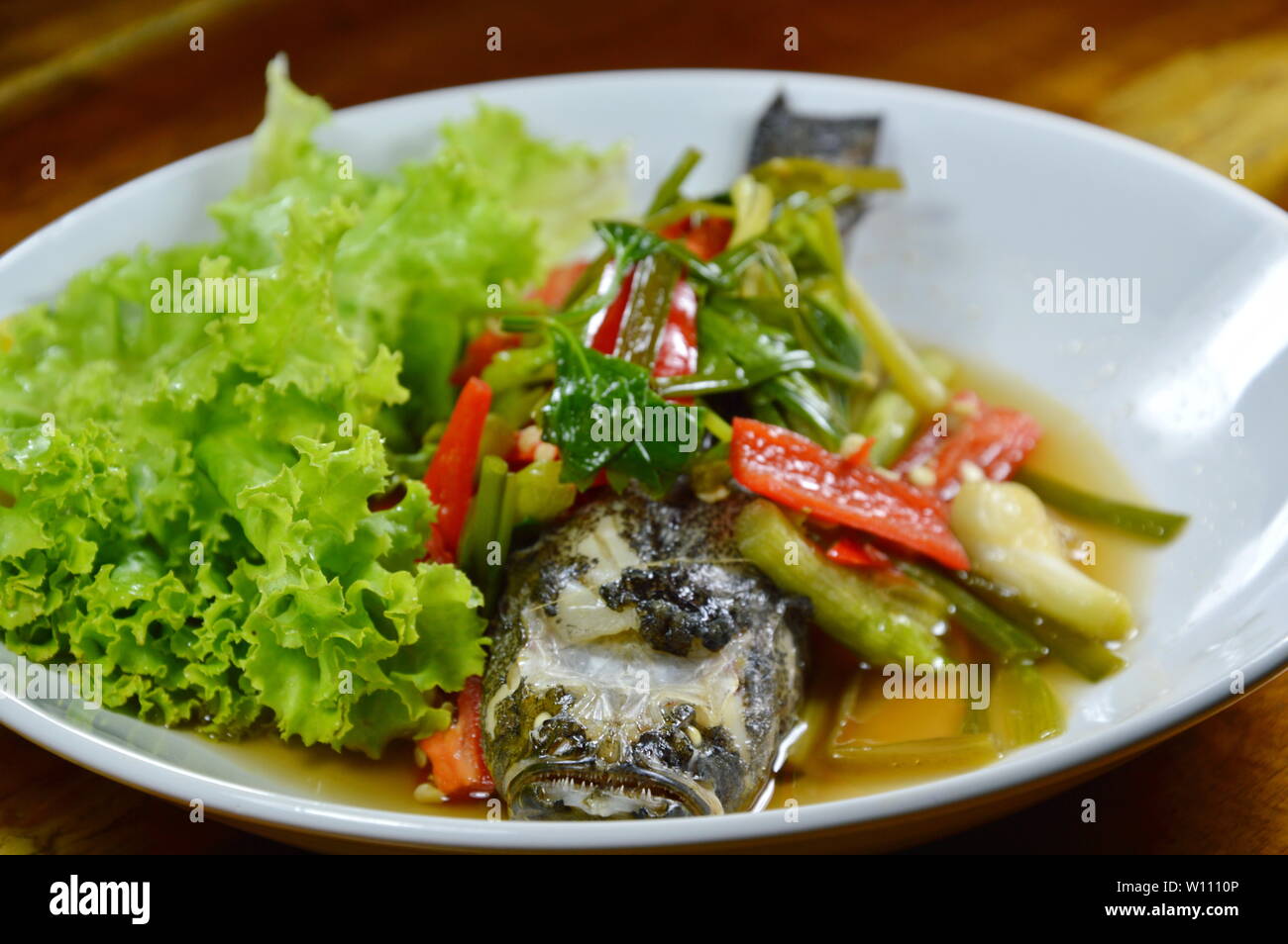 steamed sand goby fish with soy sauce on dish Stock Photo - Alamy