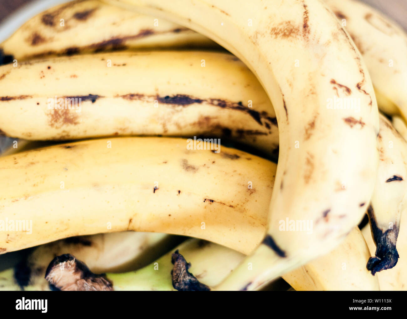 Fresh ripe bananas background, vegetarian concept Stock Photo - Alamy
