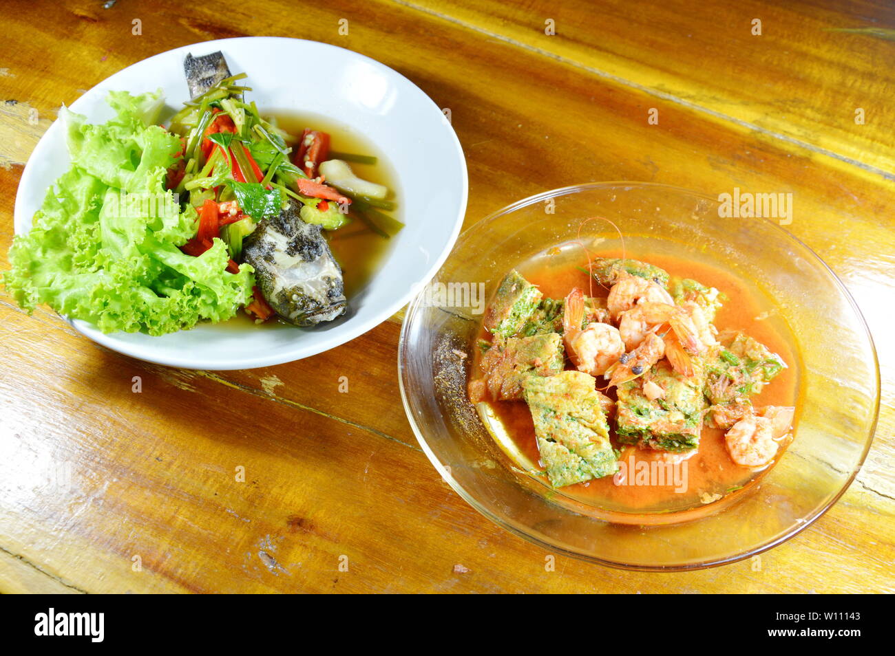 steamed goby with soy sauce and fried egg in spicy soup Stock Photo - Alamy