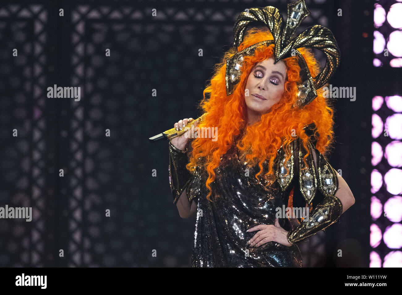Cher performs on stage during her "Here we Go Again" tour in Calgary ...