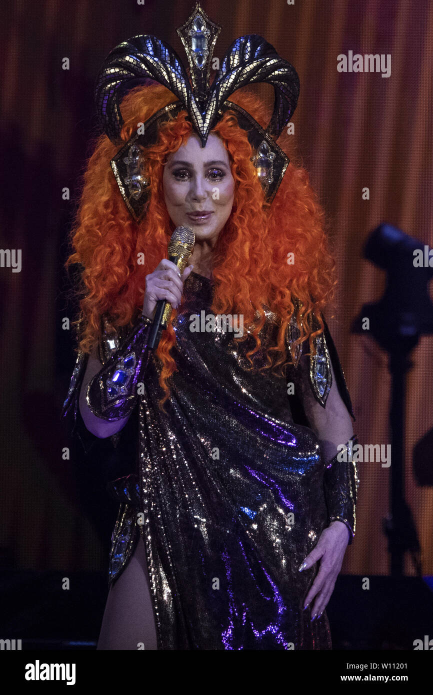 Cher performs on stage during her "Here we Go Again" tour in Calgary ...
