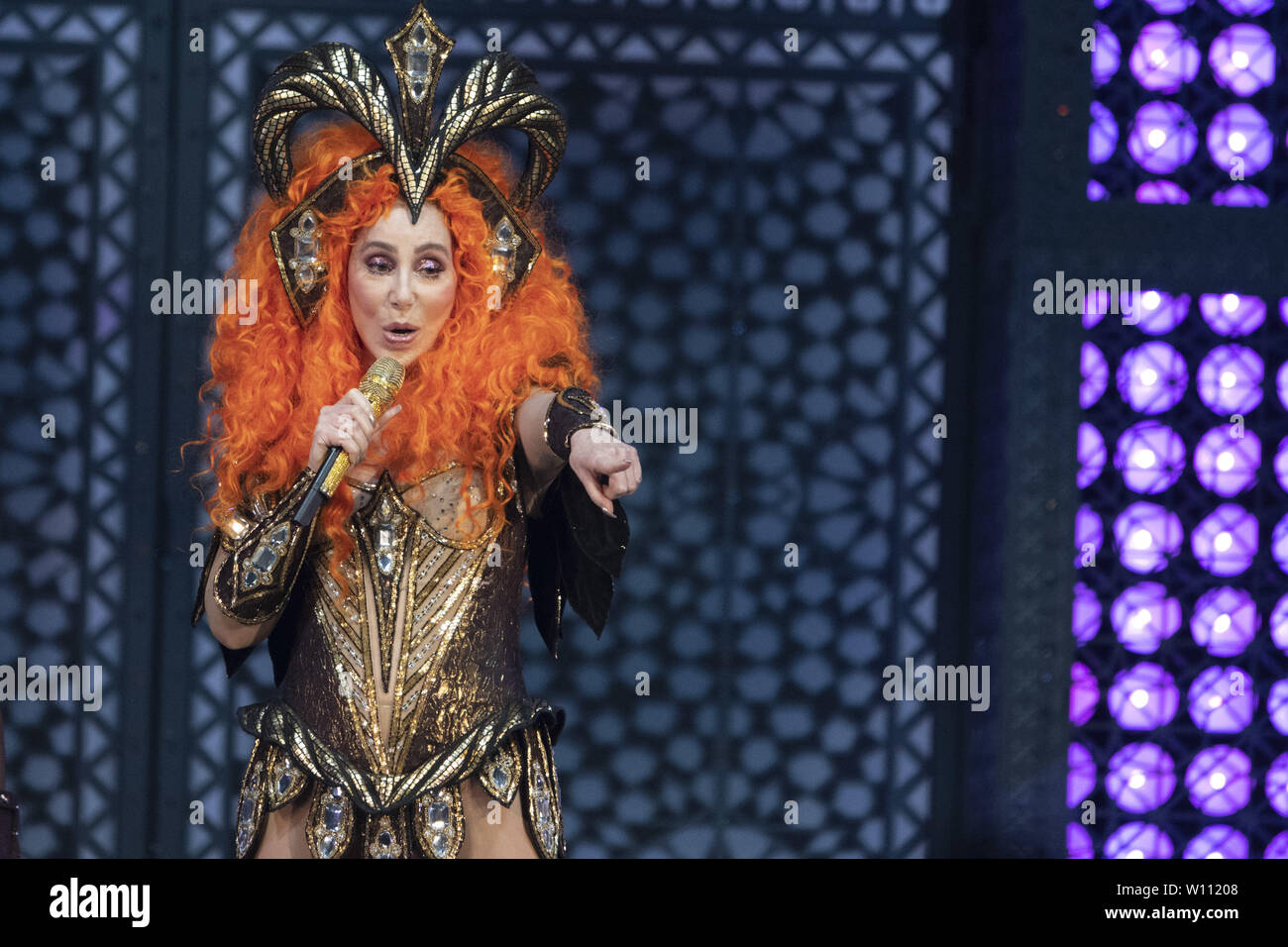 Cher performs on stage during her "Here we Go Again" tour in Calgary ...