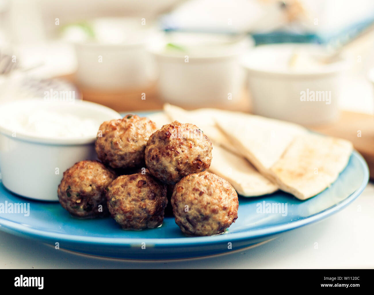 Fried minced meat with sauce and tortillas, traditional Greek lunch on ...