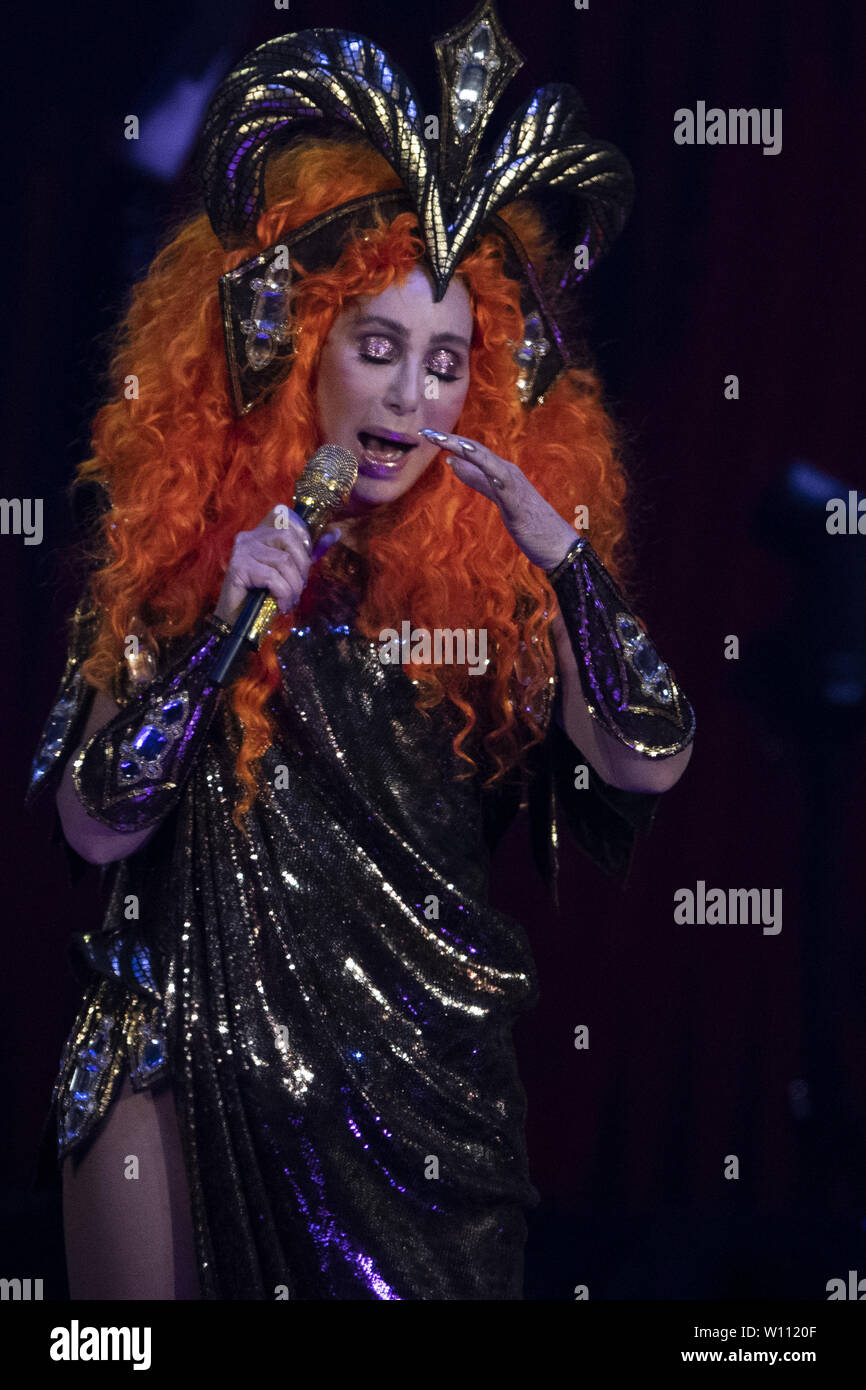 Cher performs on stage during her "Here we Go Again" tour in Calgary ...