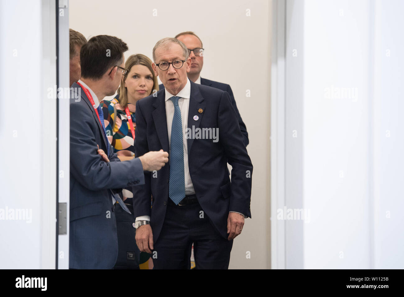 Philip May, husband of Prime Minister Theresa May takes his seat before ...