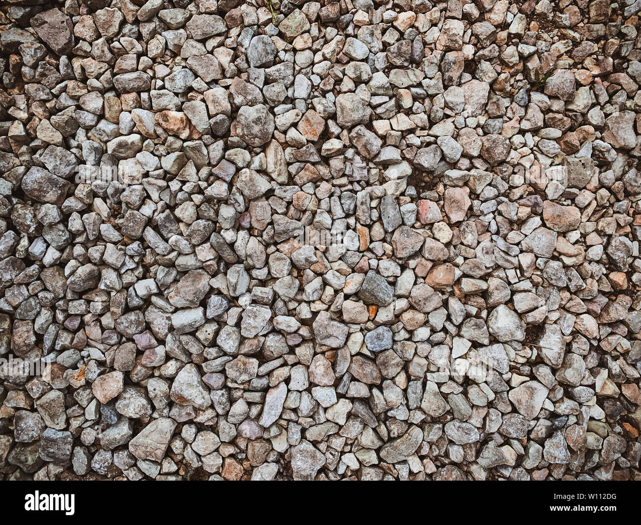 many stones gravel design background Stock Photo - Alamy