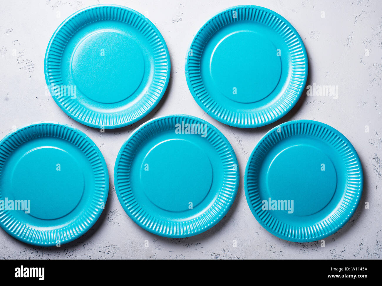 Eco friendly blue paper plates. Zero waste concept Stock Photo - Alamy