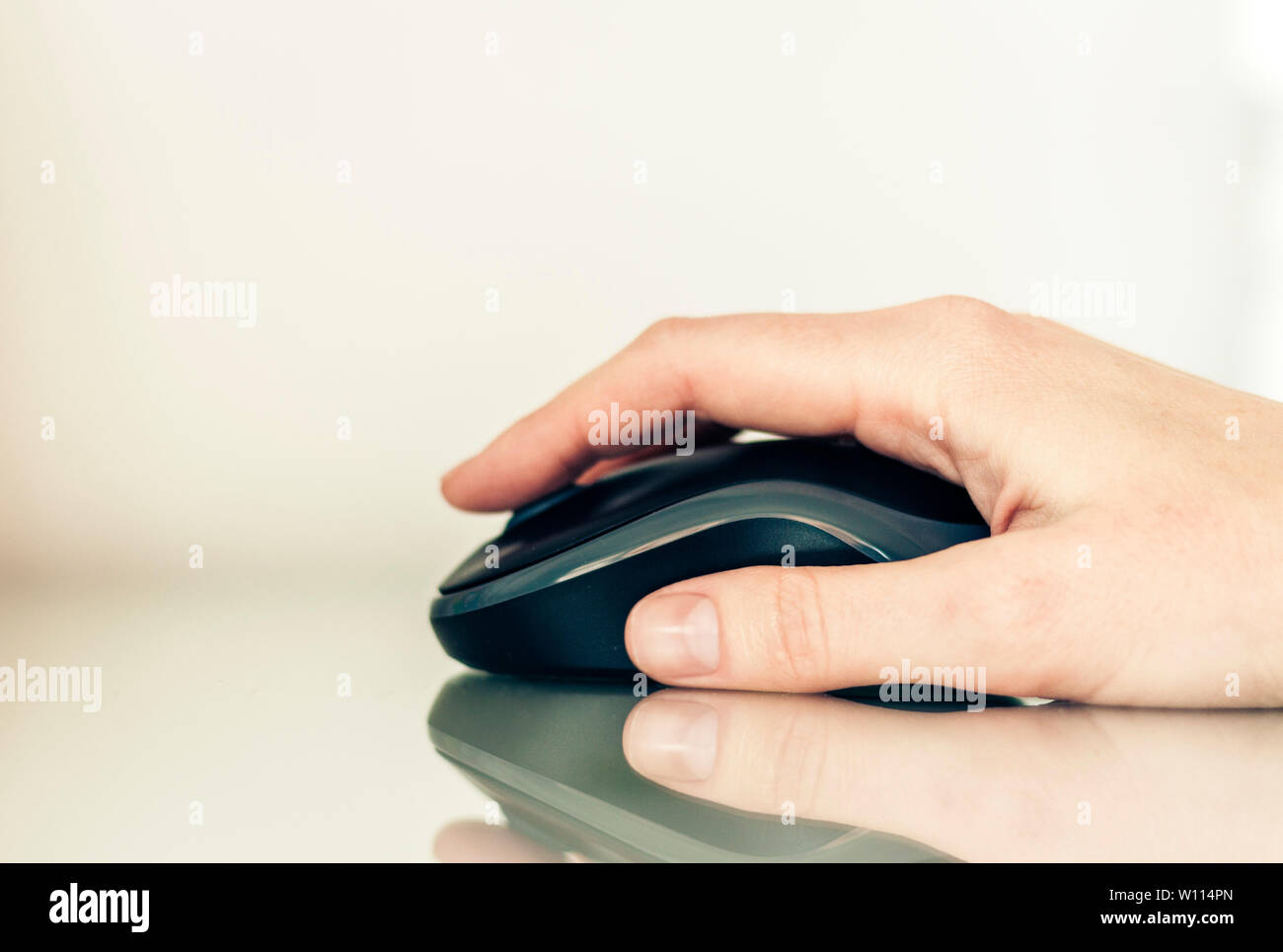 Female hand holding computer mouse hi-res stock photography and images ...