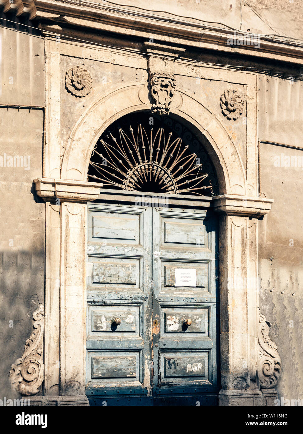 Entrance door, facade of old baroque building in Catania, traditional ...