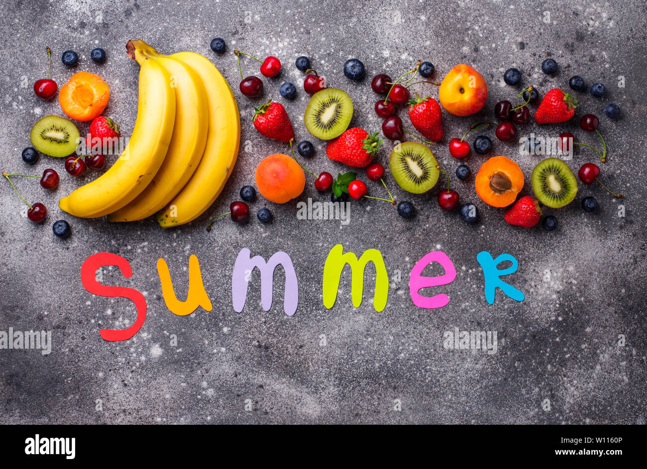 Fruits and berries summer background. Vitamins concept Stock Photo - Alamy