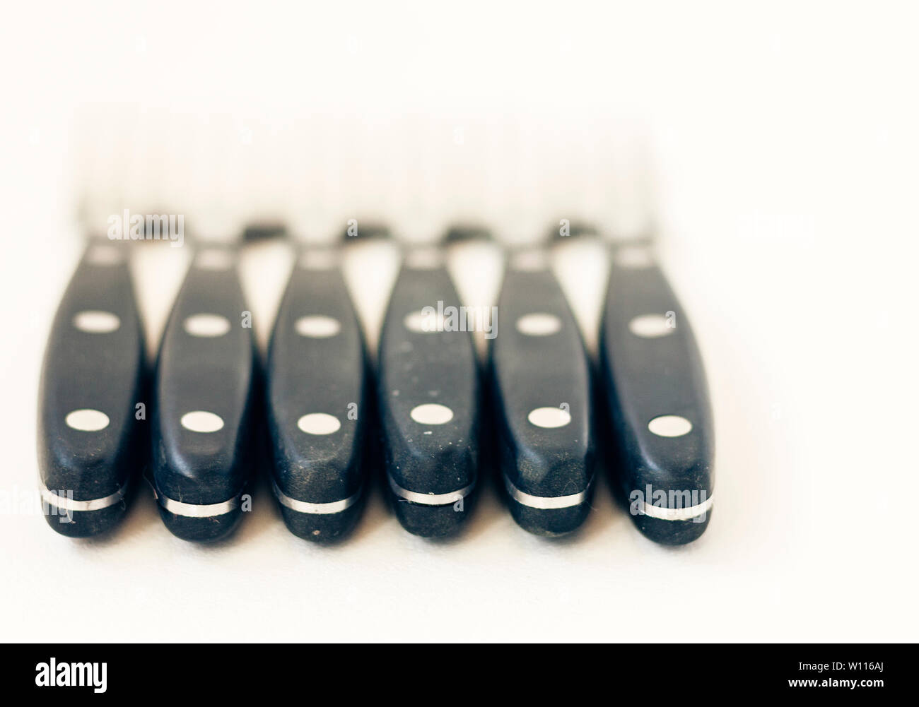 Close up six forks isolated on white background Stock Photo - Alamy