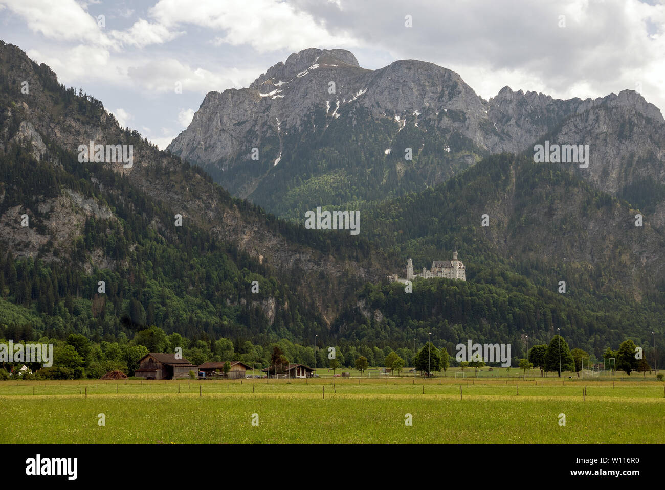 Neuschwanstein Castle in southern Bavarian, at the bottom Alpine ...