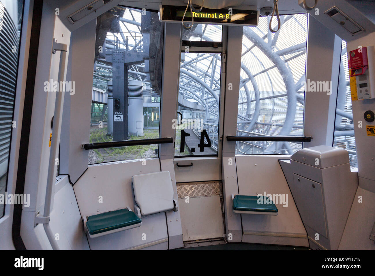 In the cabin of the SkyTrain, the driverless monorail connects the ...