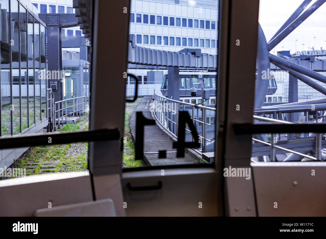 In the cabin of the SkyTrain, the driverless monorail connects the ...
