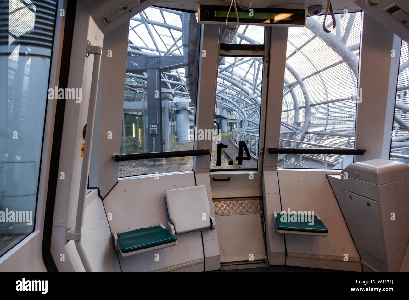 In the cabin of the SkyTrain, the driverless monorail connects the ...