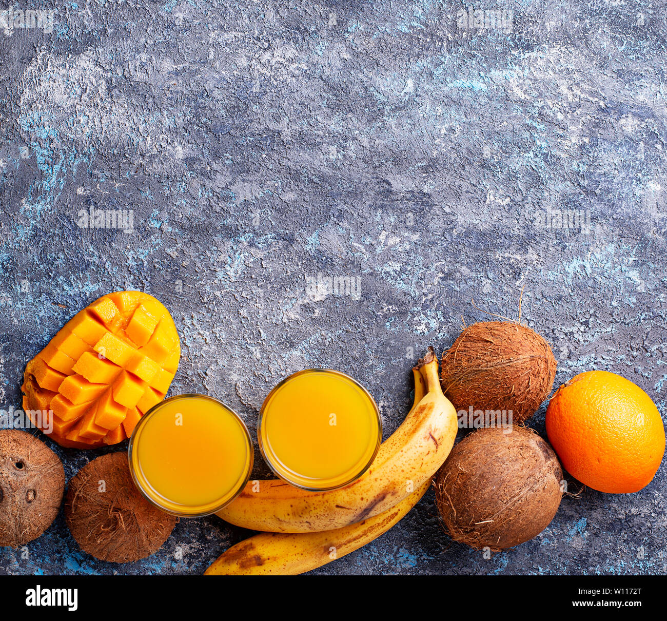 Fresh tropical mix fruit juice Stock Photo - Alamy