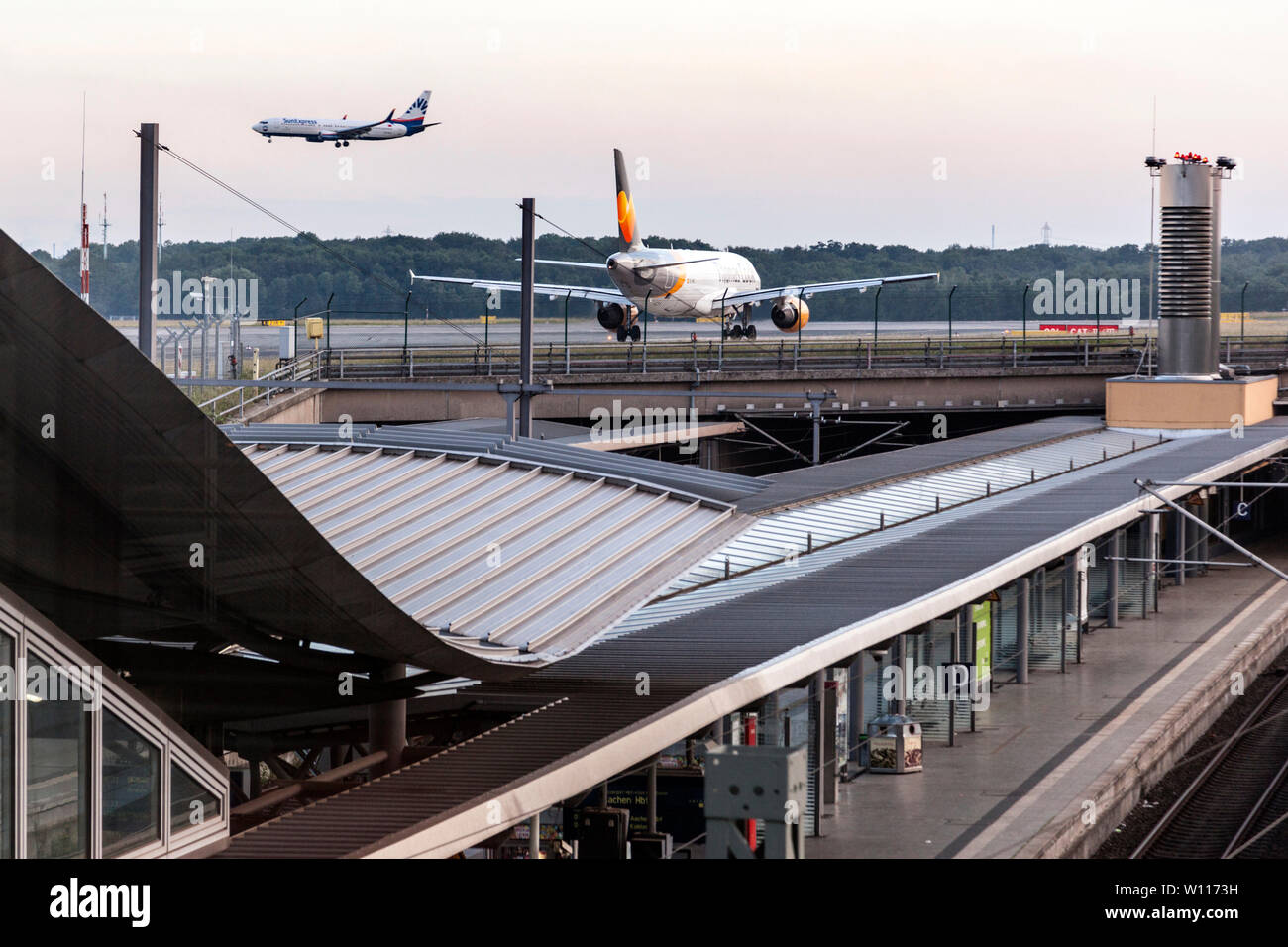 Flight operations at Airport International next to the airport station ...