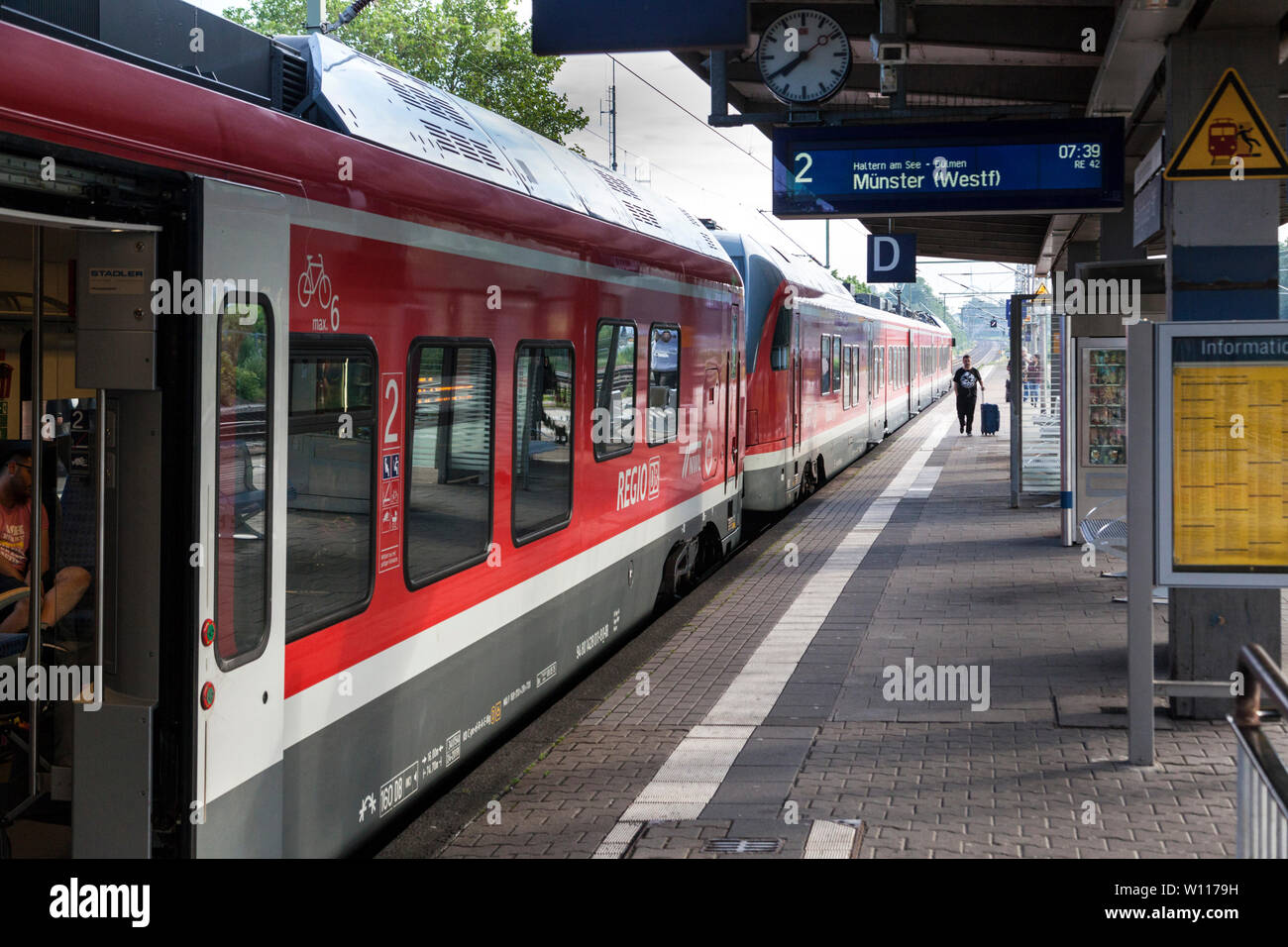 Commuter train on the station Stock Photo - Alamy