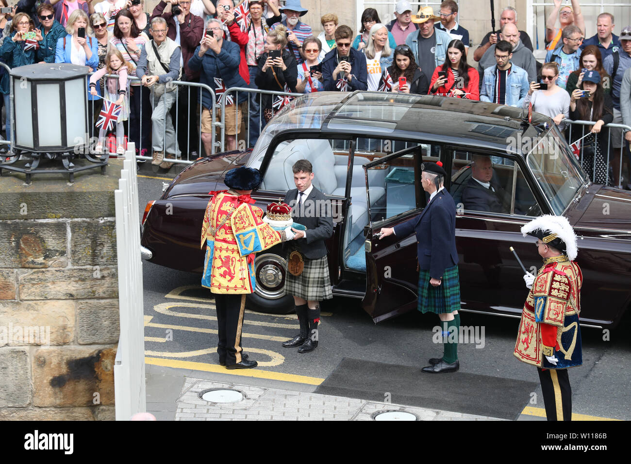 The Duke of Hamilton arrives with the Crown of Scotland at the Scottish ...