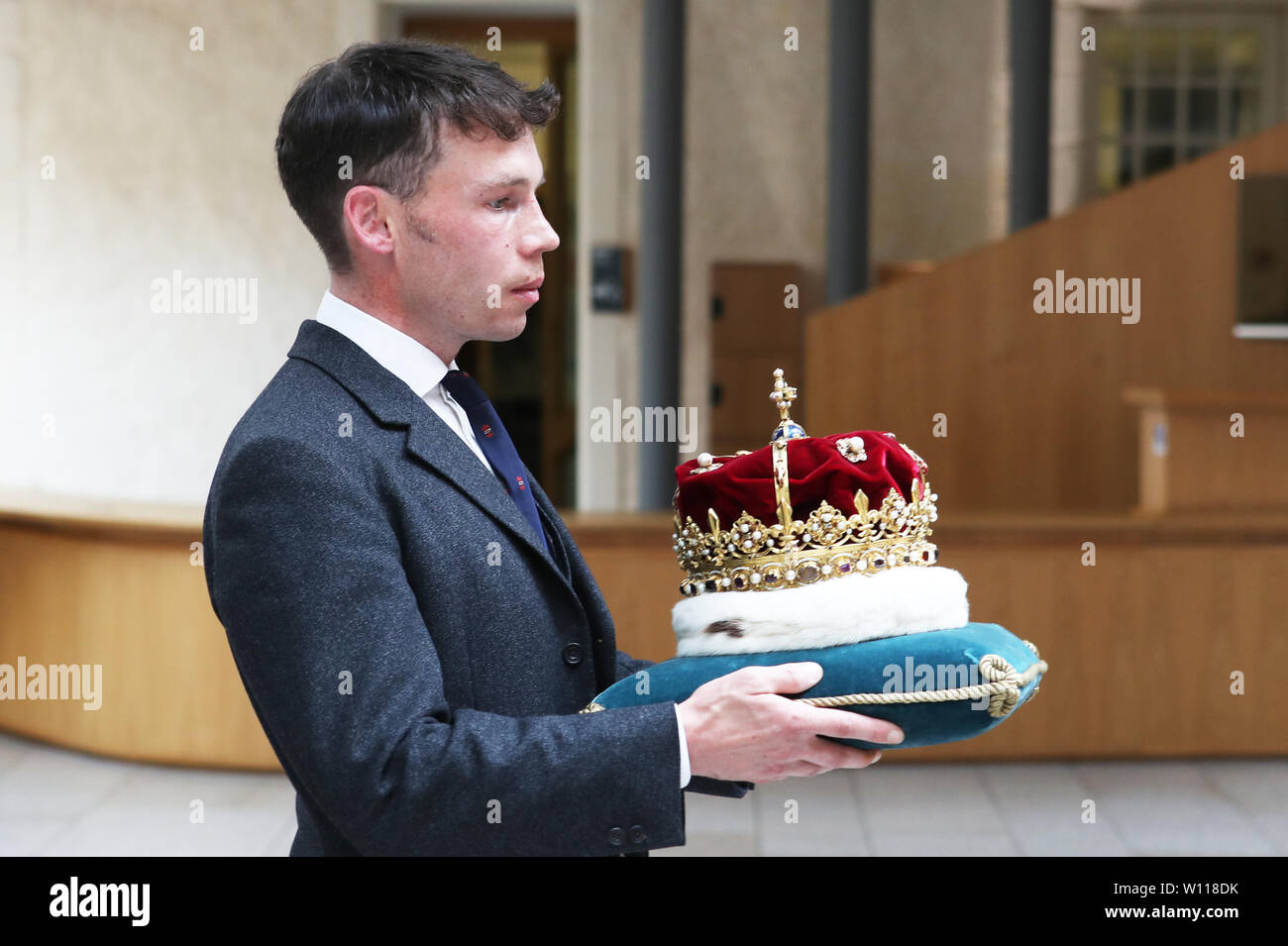 The Duke of Hamilton carries the Crown of Scotland into the Scottish ...
