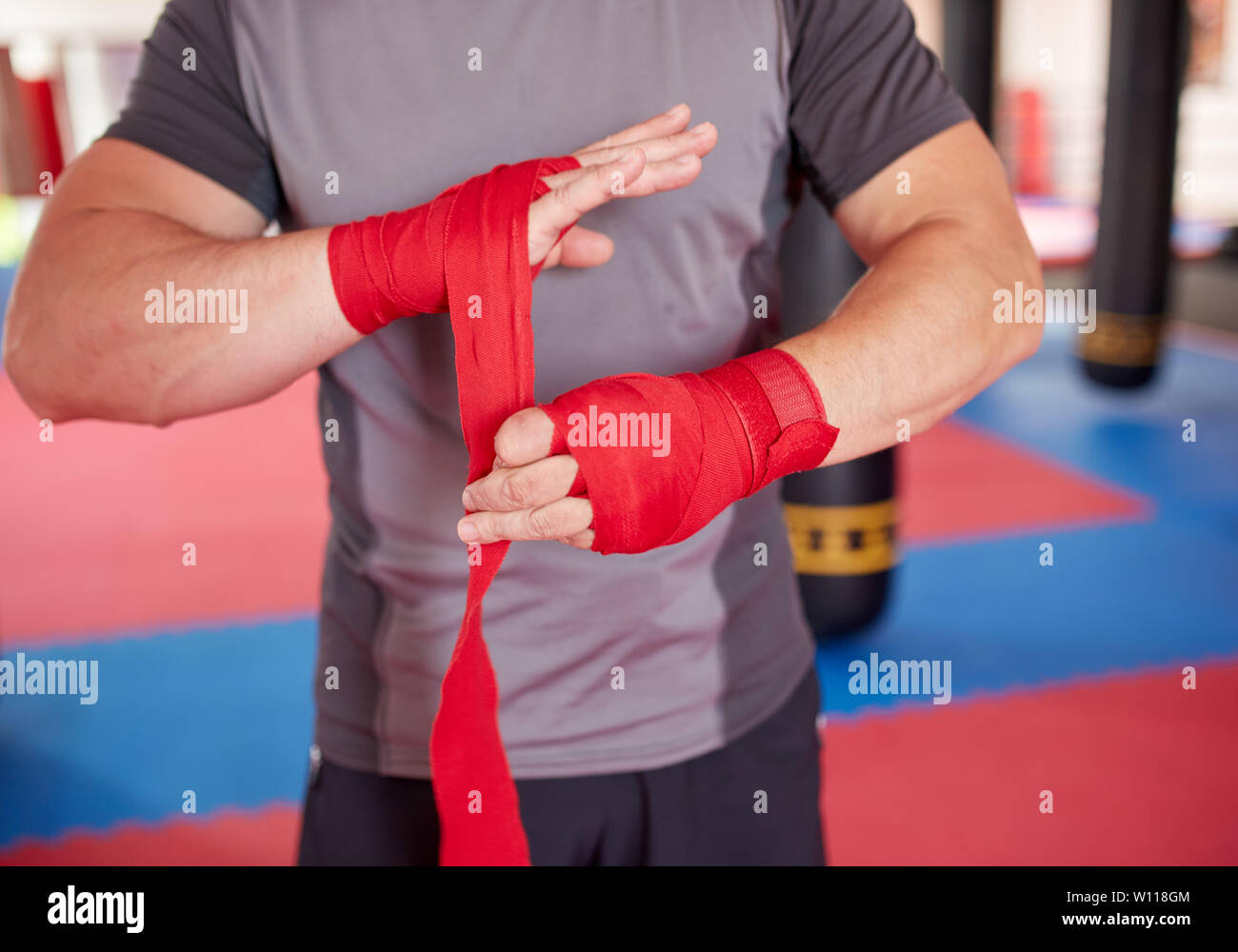 Boxer wrapping his hands before training Stock Photo - Alamy
