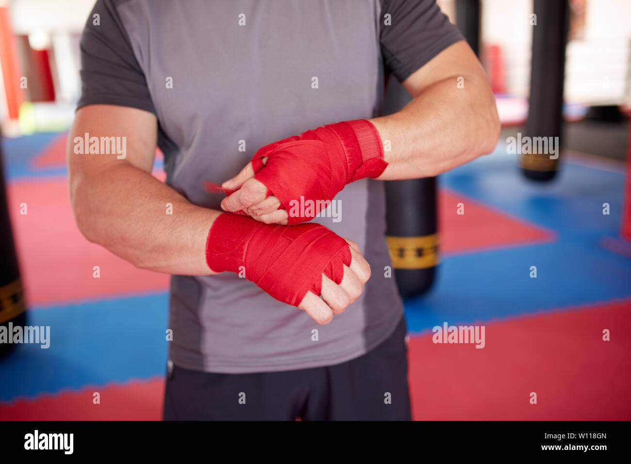 Boxer wrapping his hands before training Stock Photo - Alamy