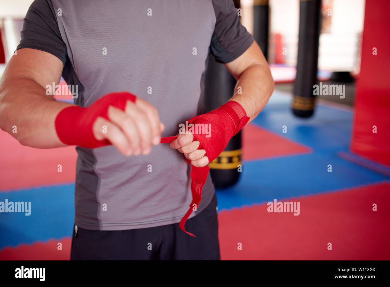 Boxer wrapping his hands before training Stock Photo - Alamy