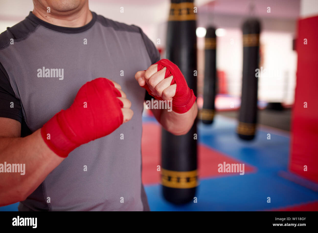 Boxer wrapping his hands before training Stock Photo - Alamy