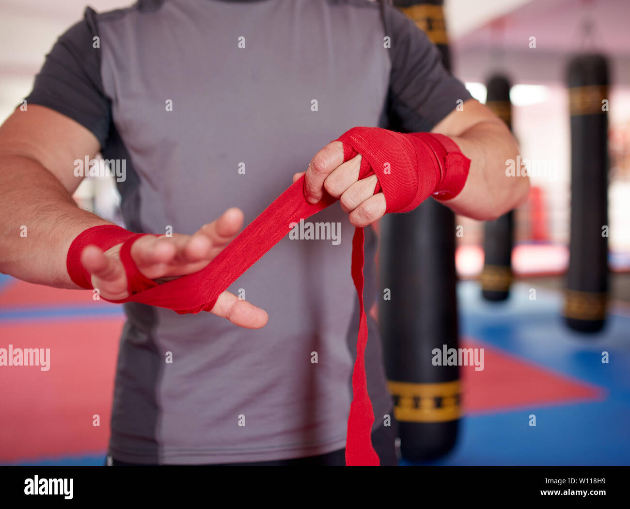 Boxer wrapping his hands before training Stock Photo - Alamy