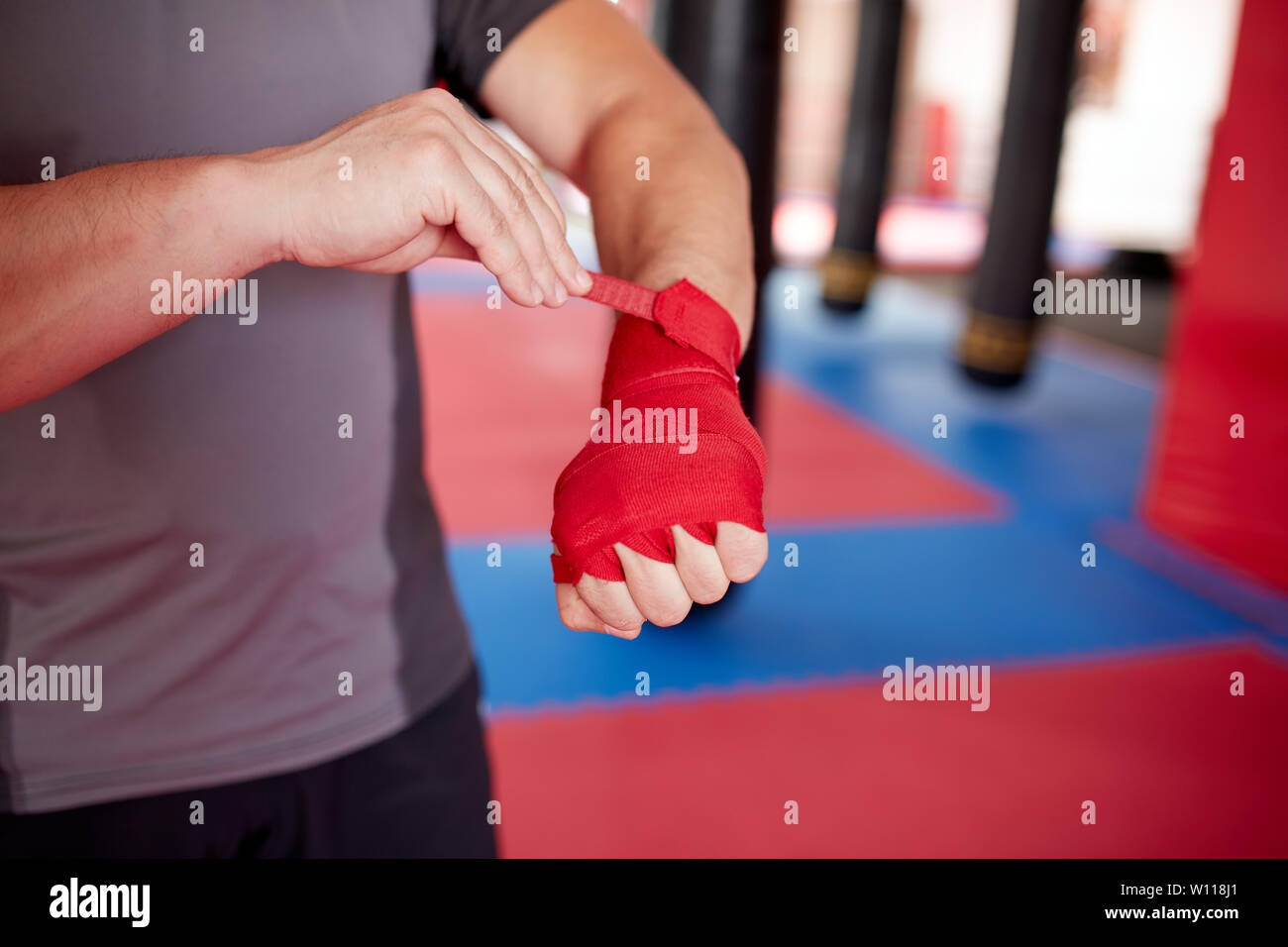 Boxer wrapping his hands before training Stock Photo - Alamy