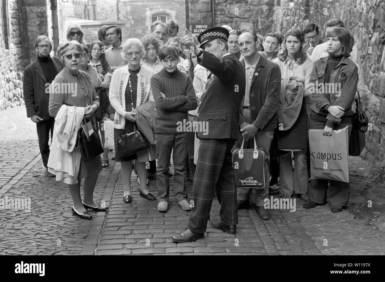 Tour Guide UK. Elderly old soldier wearing medals works as tour guide ...