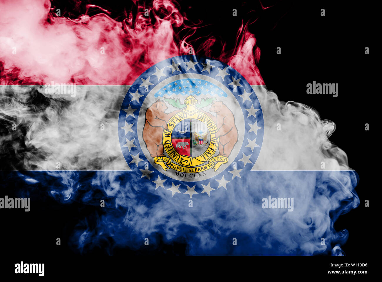 The national flag of the US state Missouri in against a gray smoke on ...