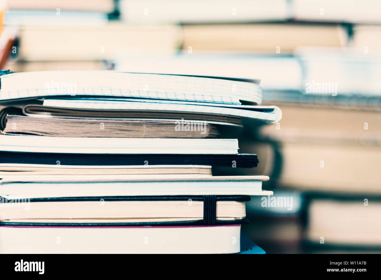 Stack of notebooks background, in office for education learning concept ...