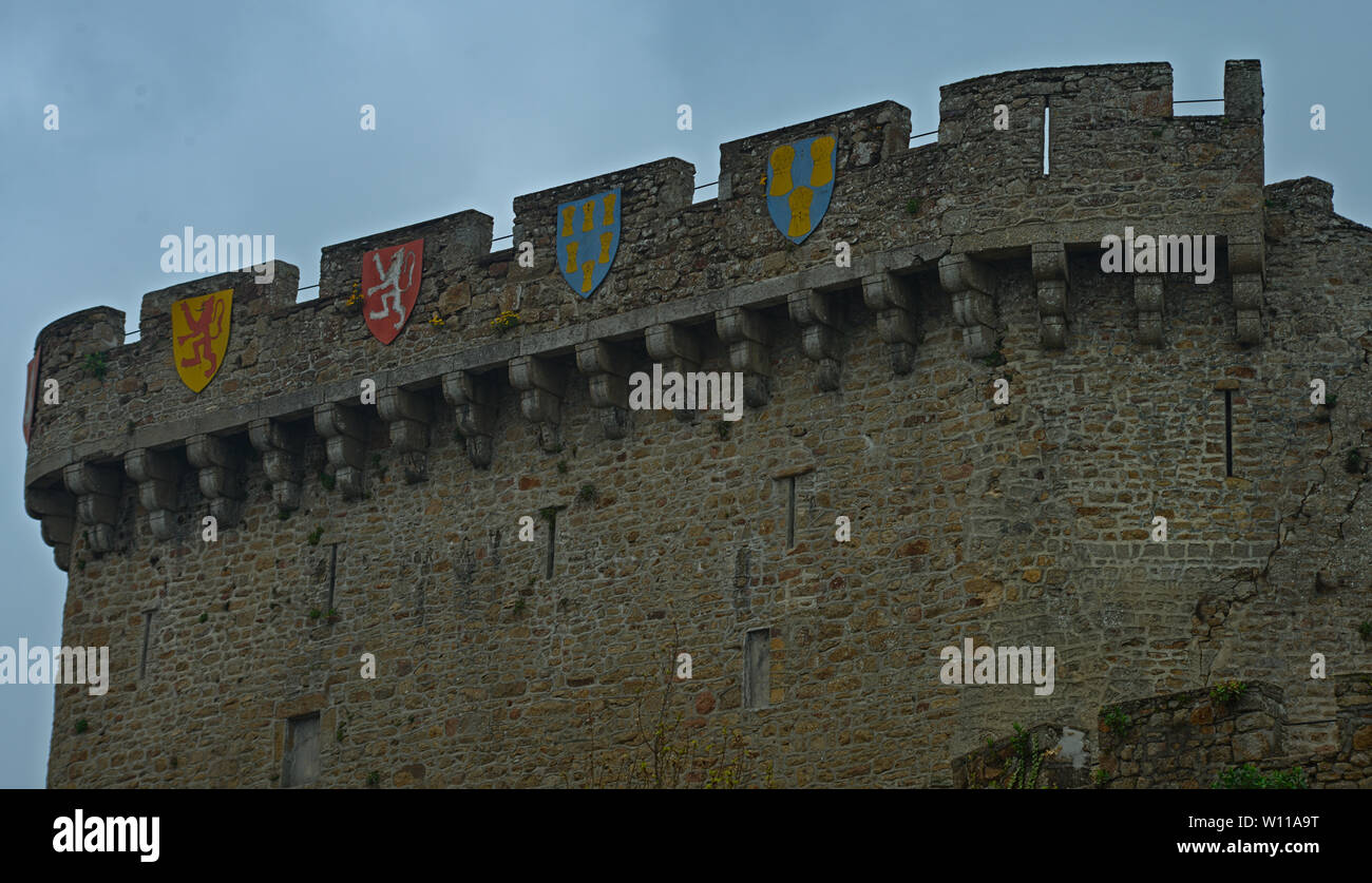 Stone wall with shields at fortress in Avranches, France Stock Photo ...