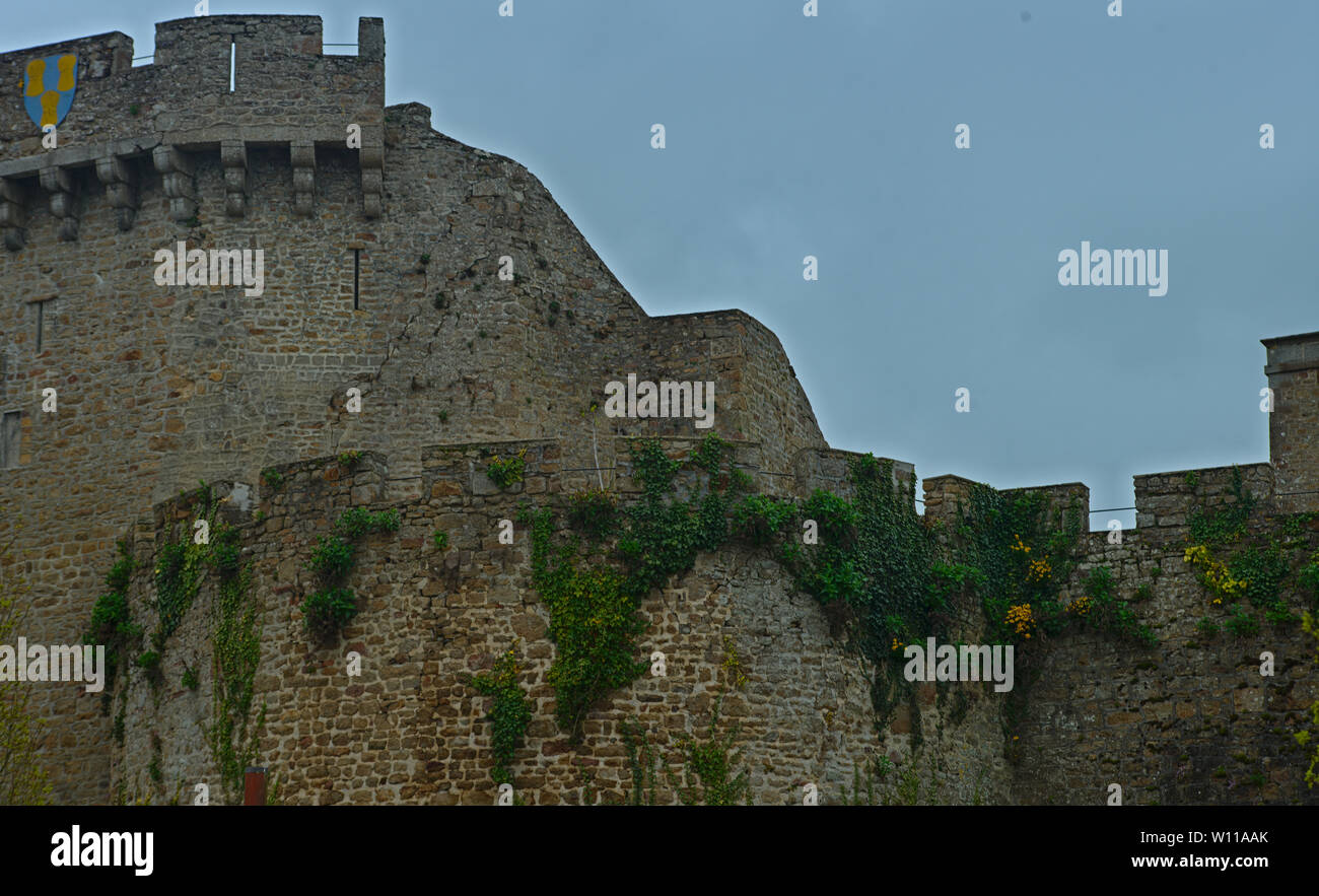 Stone wall with shield at fortress in Avranches, France Stock Photo - Alamy