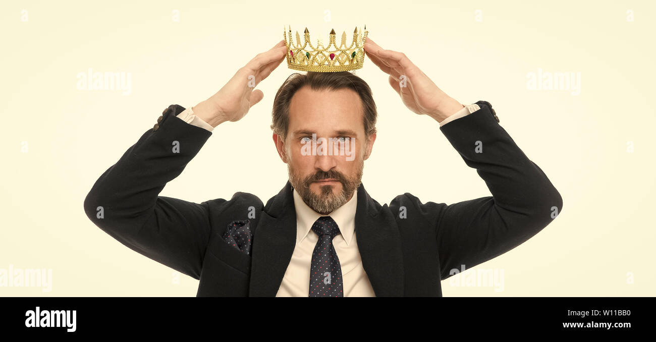 Monarchy family traditions. Man nature bearded guy in suit hold golden ...