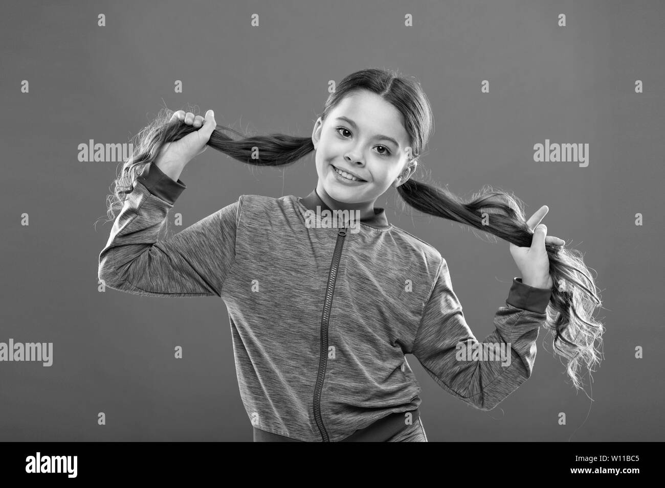 Small girl child. Hairdresser for kids. childrens day. Portrait of happy little child. Kid ...