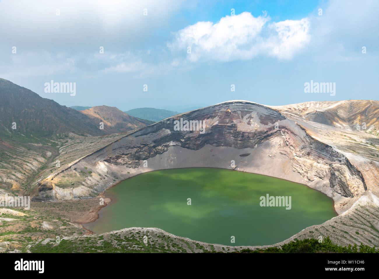 Beautiful view of Okama crater lake at Mount Zao in summer sunny day ...