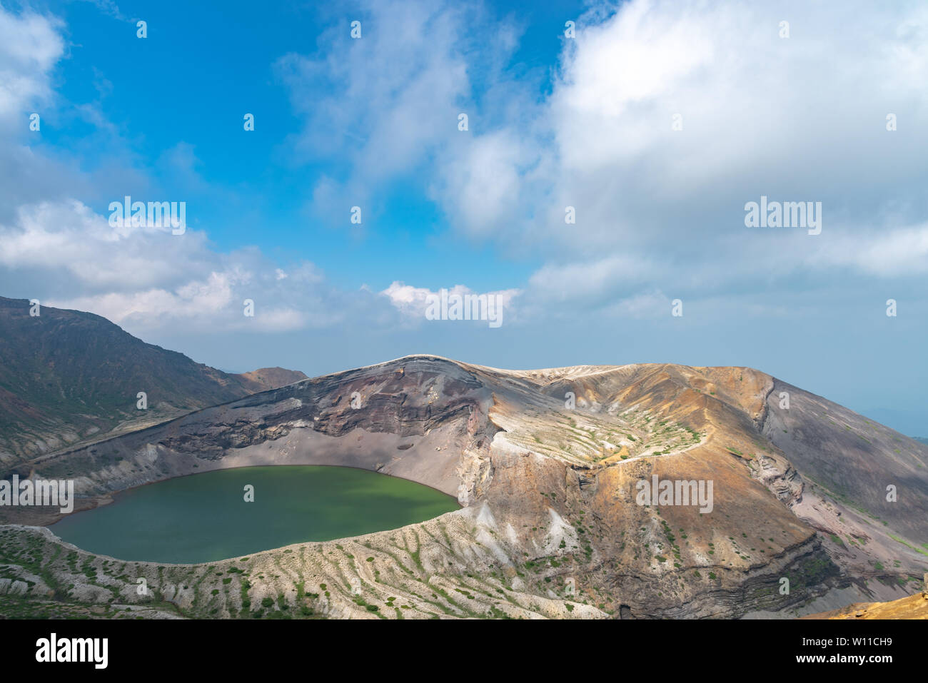 Beautiful view of Okama crater lake at Mount Zao in summer sunny day ...