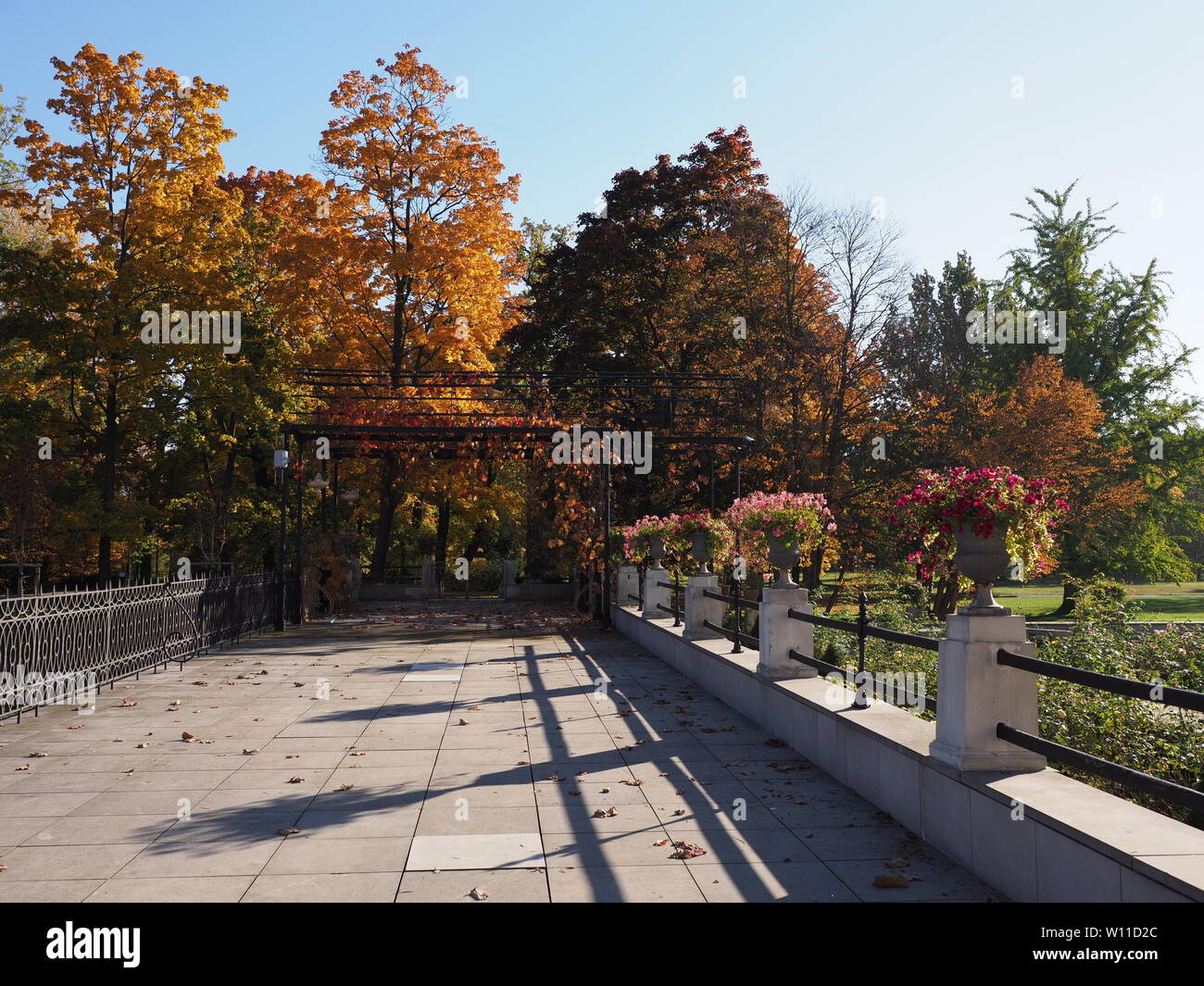 Garden landscape with alley in Warsaw european capital city of Poland ...