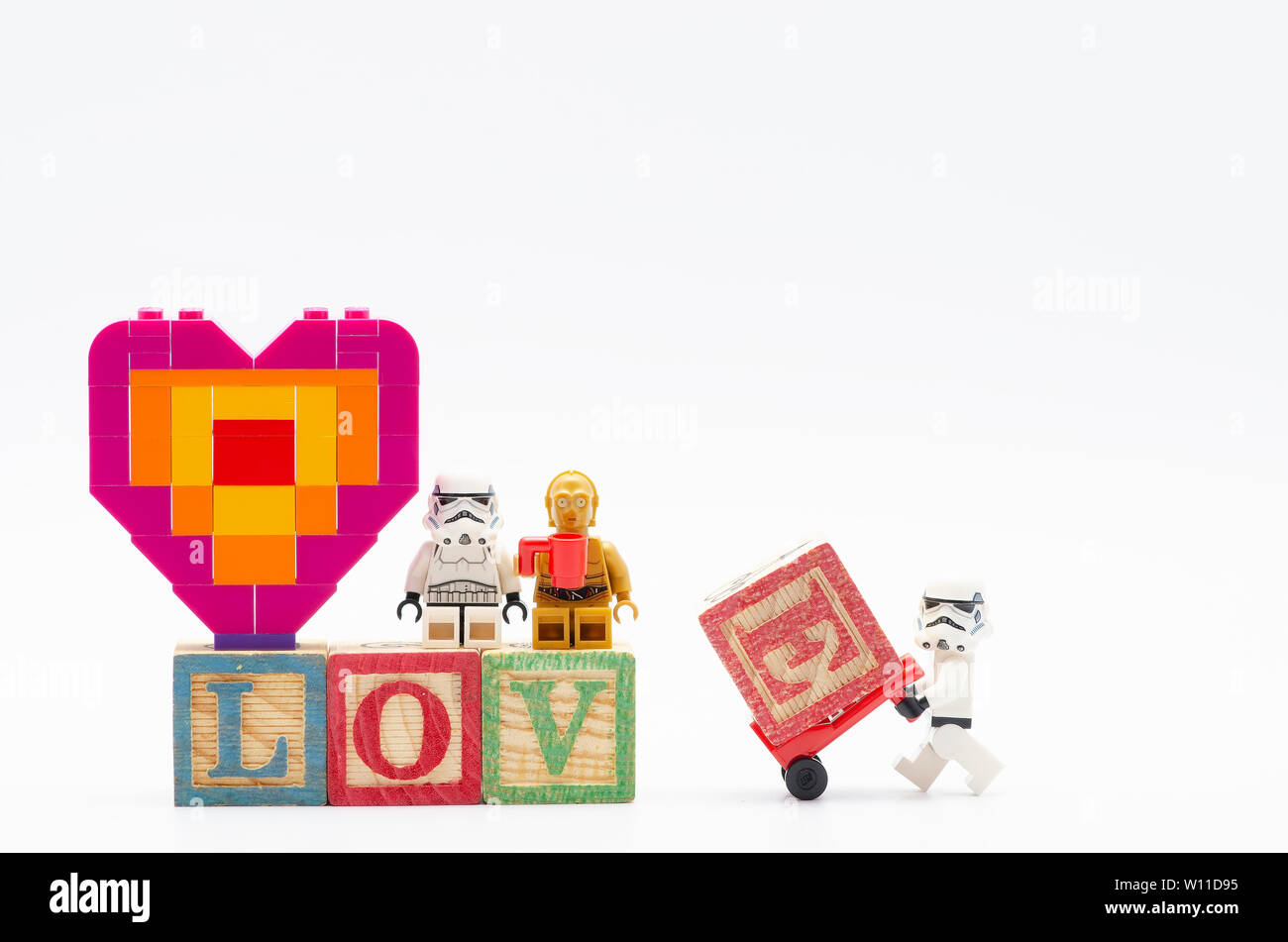 lego storm trooper with c3po sitting on word love and one of the ...