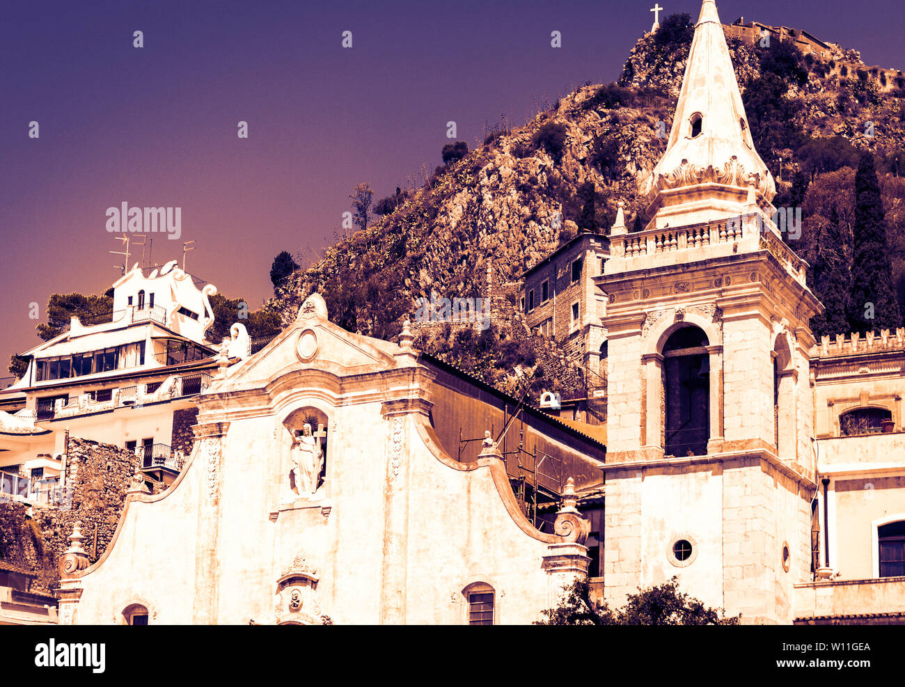 Sicily sunset, facade wall of old baroque building in Taormina ...