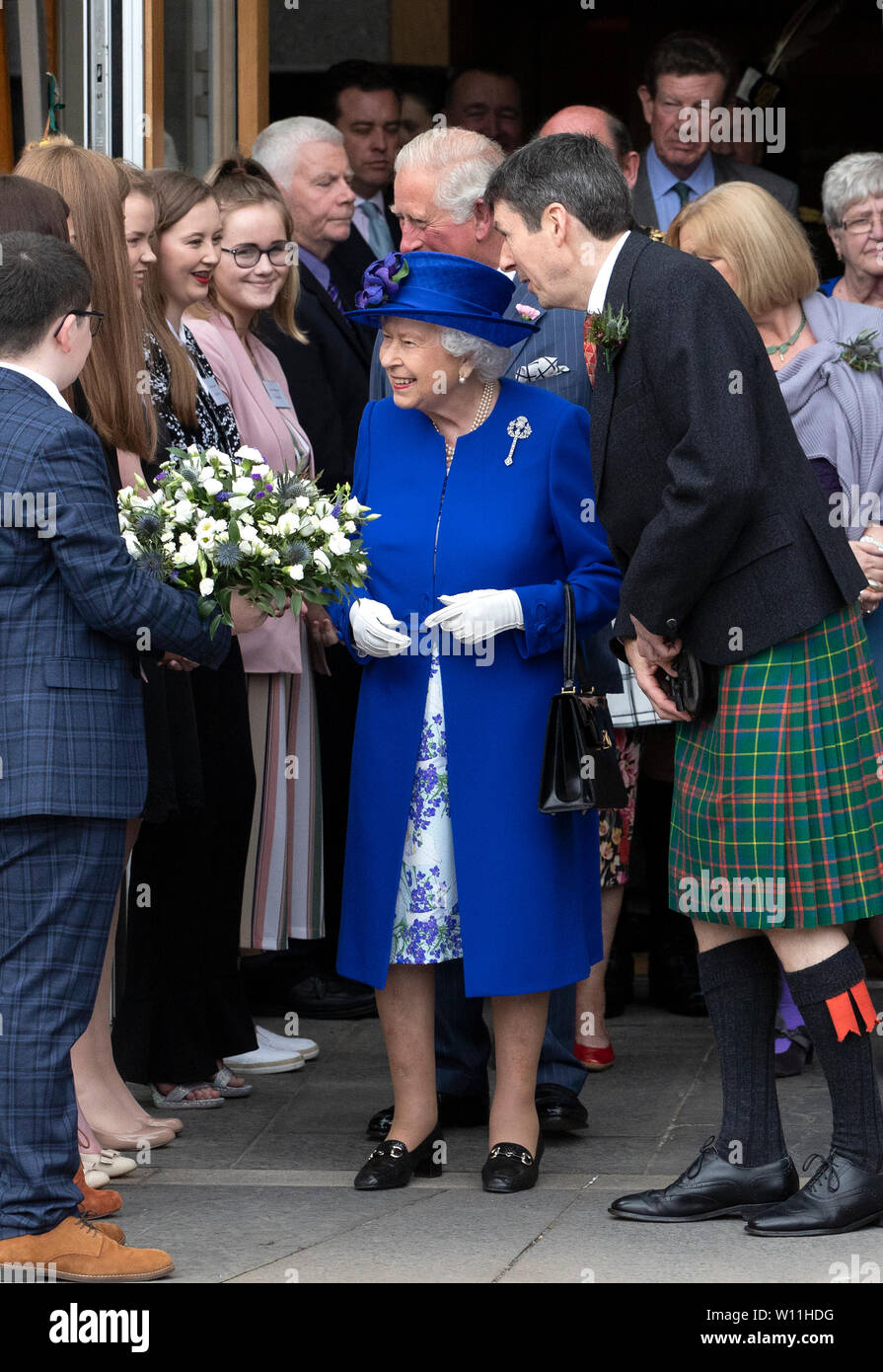 Queen Elizabeth II, accompanied by Ken Macintosh (right), Presiding ...