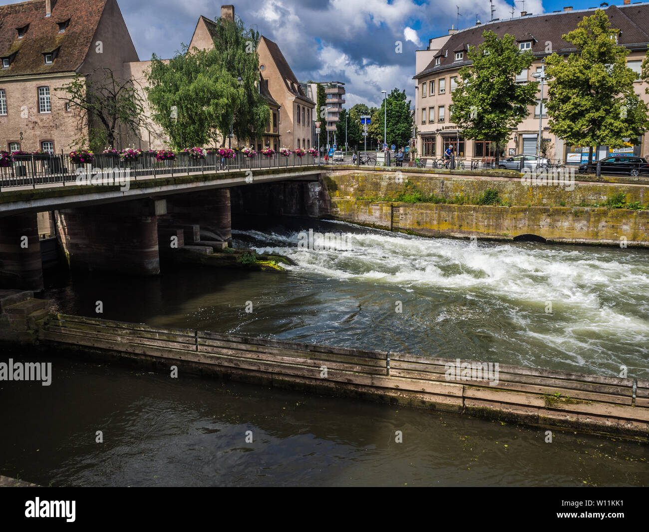 White water flowing under a bridge in Interlaken, Switzerland Stock ...