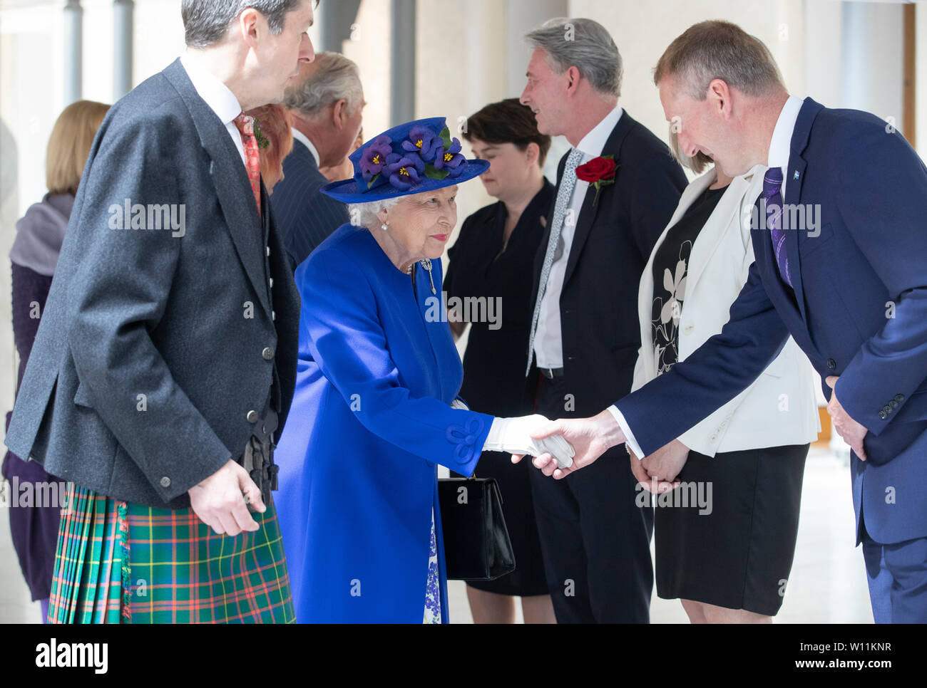 Queen Elizabeth II meets Scottish Liberal Democrat Tavish Scott (right ...
