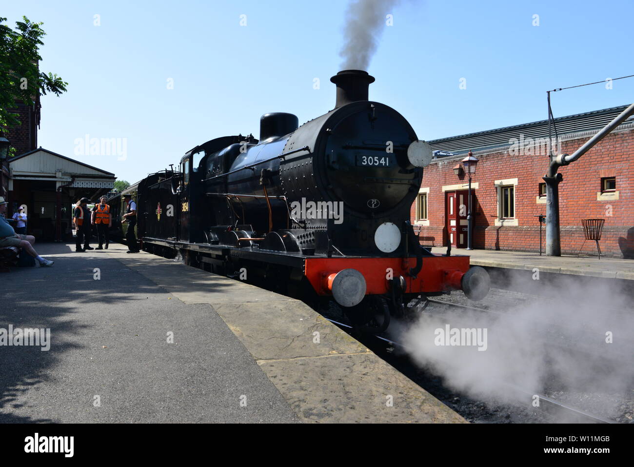 An SR Q class locomotive in steam on the Bluebell Railway Stock Photo ...