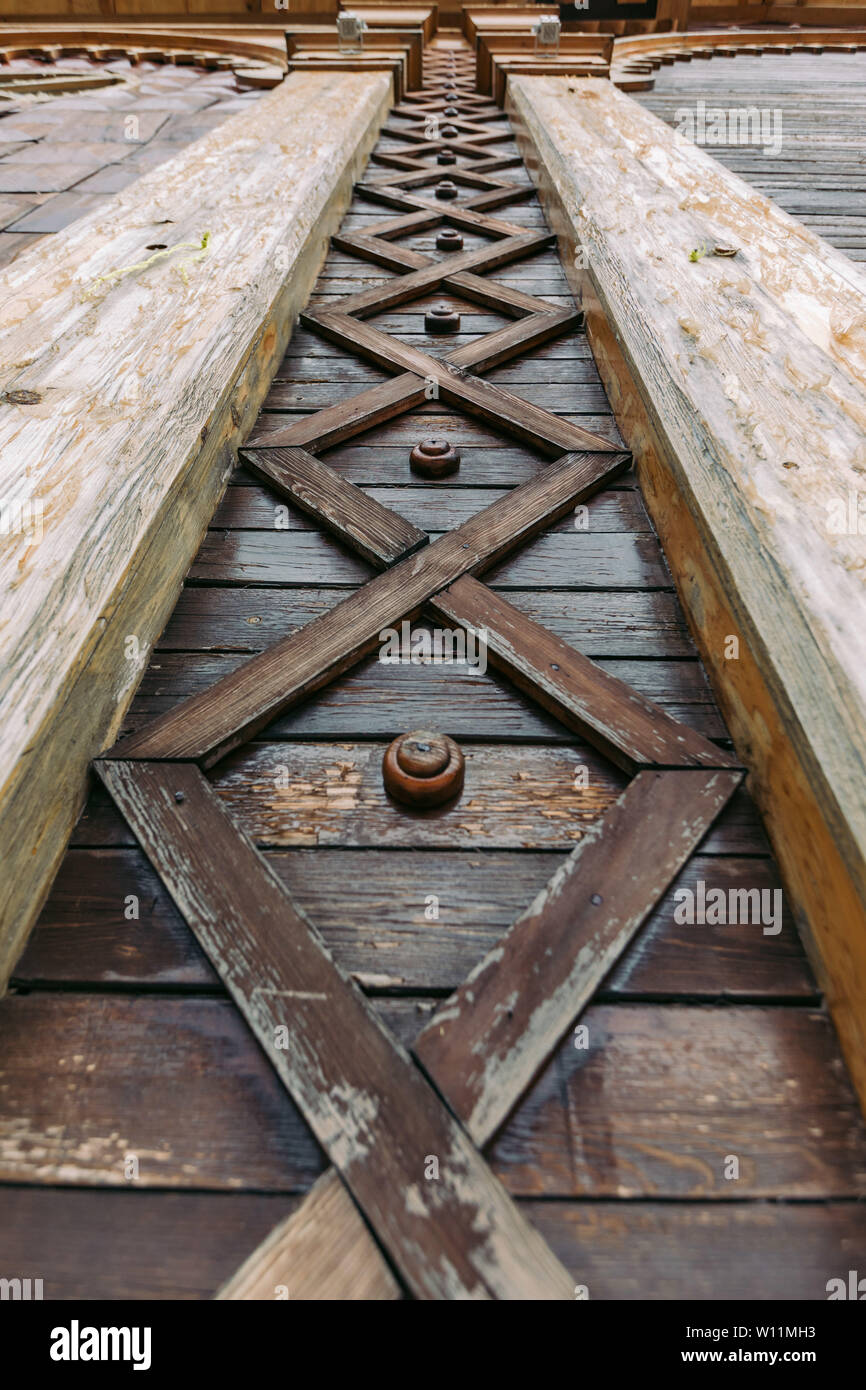 wooden elements on the doors of an old wooden building Stock Photo - Alamy