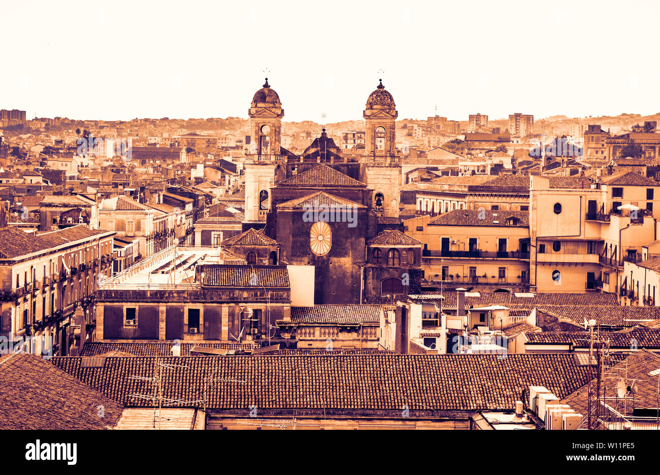 Sunset in Catania, aerial cityscape, traditional architecture of Sicily ...